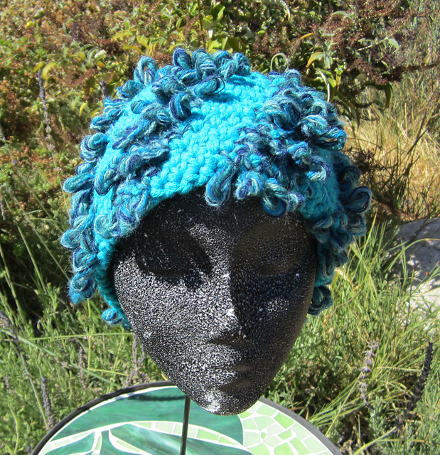 Ravelry: Reversible Anemone Hat pattern by Monika Evans