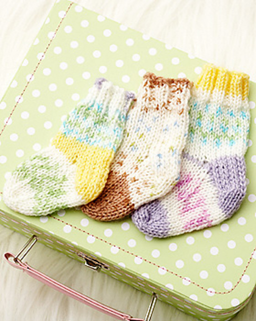 Ravelry: Pretty Pattern Baby Socks pattern by Bernat Design Studio