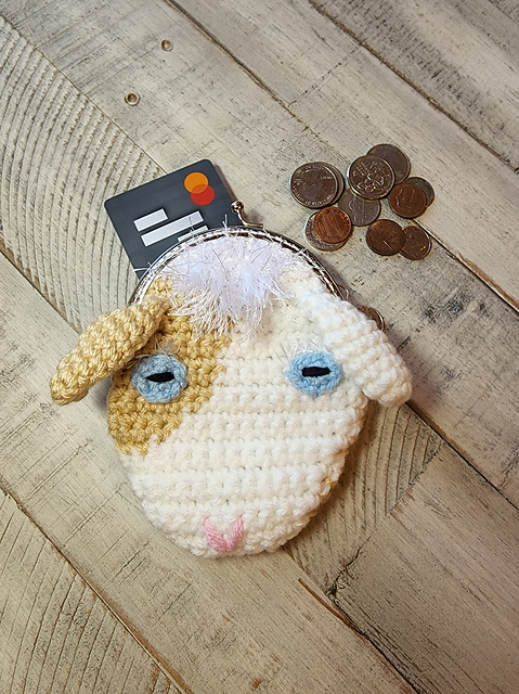 Ravelry: Baby Goat Coin Purse pattern by Lisa Ferrel