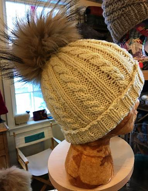 Ravelry: Cable Poof Hat pattern by Nancy O'Connell