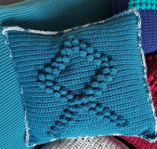 Ravelry: OTHALA Rune Pillow pattern by Nadine Sueppmayer