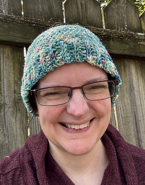Ravelry: Eureka Messy Bun Hat pattern by Sarah E. White