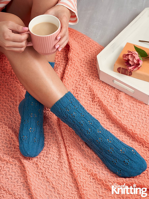 Ravelry: Scattered Flower Socks pattern by Caroline Birkett