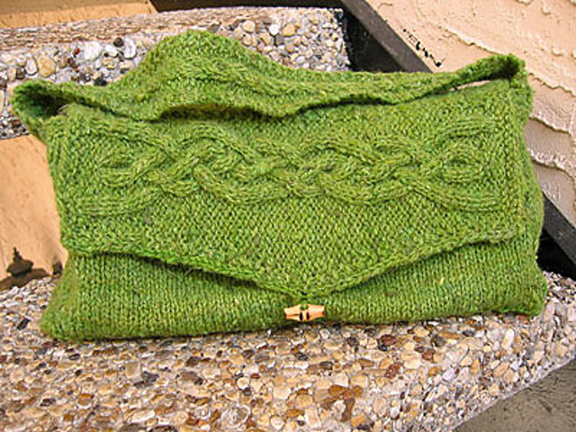 Ravelry: Aileen Celtic Cabled Purse pattern by Jennifer Tallapaneni