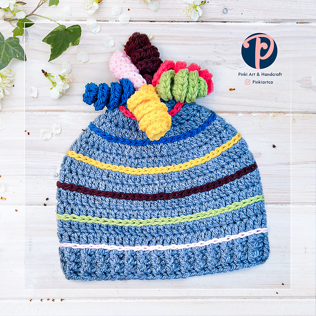 Ravelry: Curlicue Beanie pattern by Sara Smith