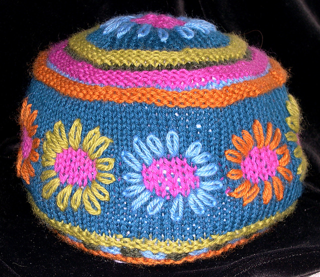 Ravelry: Sunny Flower Fez pattern by Kristin Nicholas