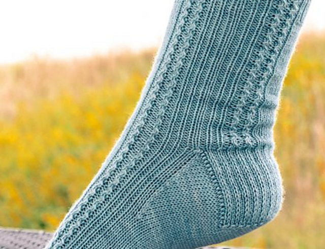 Ravelry: Ripple Ribbed Socks pattern by Susie White