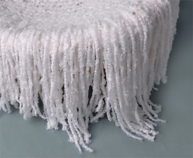 Ravelry: Newborn Knit Fringe Photography Prop pattern by Judy Jewell