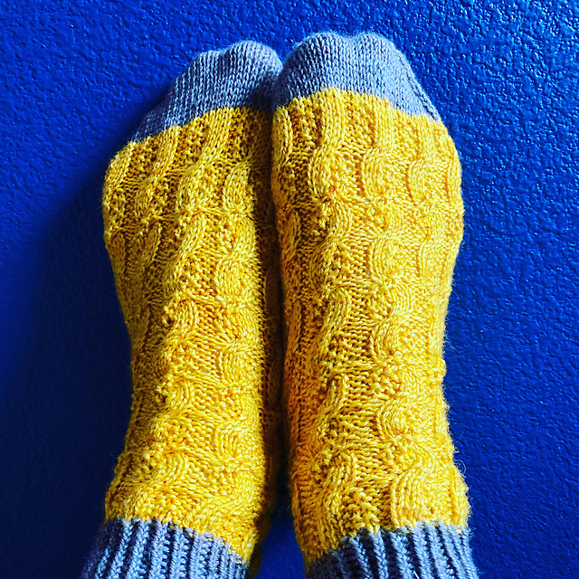 Ravelry: Seeded Cable Sock pattern by Joshua David