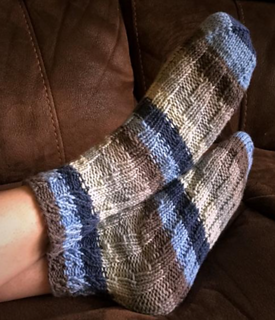 Ravelry: Spiral Slipper Socks pattern by Faith Schmidt