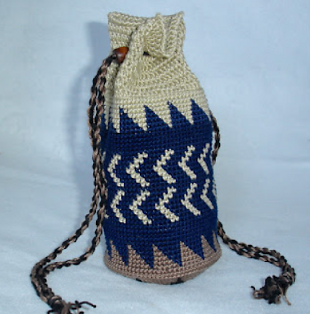 Ravelry: Black Sun Pouch pattern by Hannah Daley