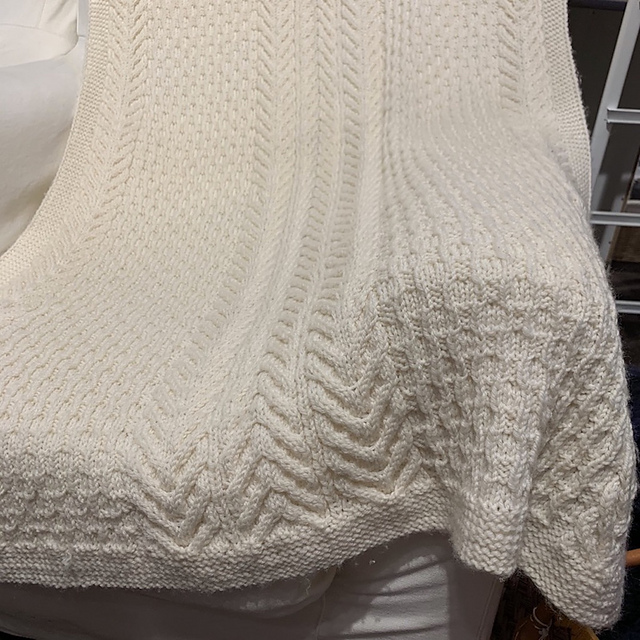 Ravelry: Staghorn Cable & Waving Rib Blanket pattern by Atelier Yarns