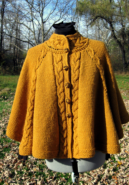 Ravelry: Cabled Fall Celebration Cape pattern by Willa Schrlau