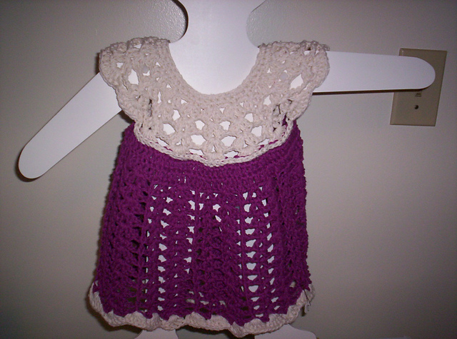 Ravelry: Collared Baby Dress pattern by Sharon Cowan
