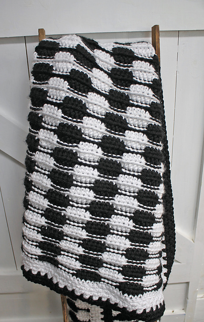 Ravelry: Black and White Wave Blanket pattern by Heather Hamlin