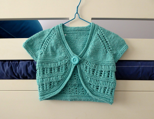 Ravelry: Curved or straight edged cardigan pattern by Sirdar
