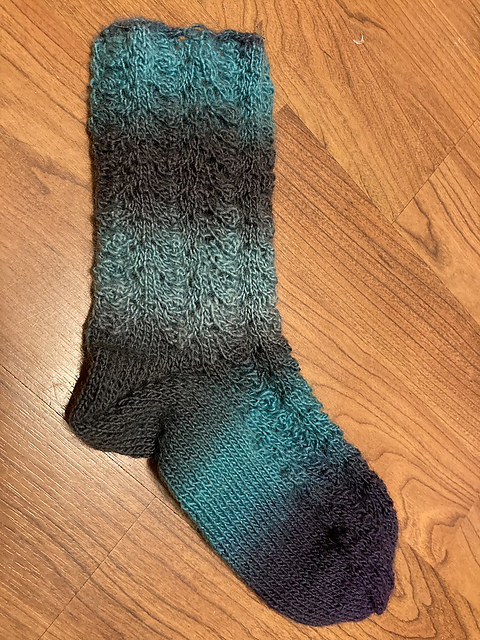 Ravelry: Fishtail Lace Socks pattern by Humbug Designs