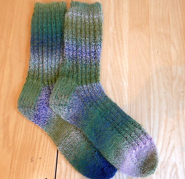 Ravelry: Twisty Mock Cable Socks pattern by Jess McCaughey
