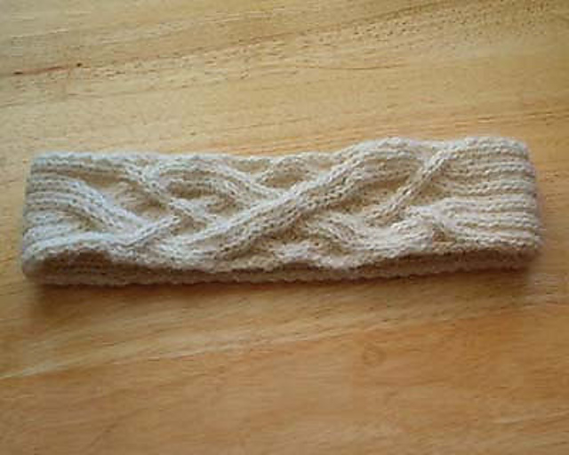 Ravelry: Wedding Ring Cable Ear Warmer pattern by TChemGrrl