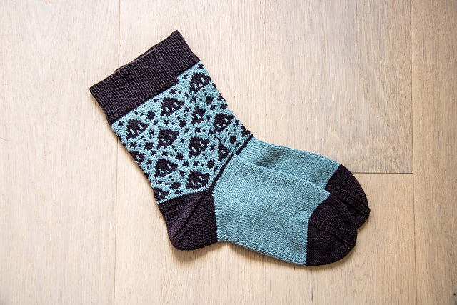Ravelry: Poop Socks pattern by Wim Vandereyken and Dennis van den Brink