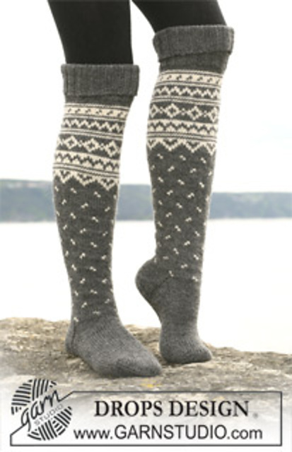 Ravelry: 110-43 socks with pattern borders pattern by DROPS design