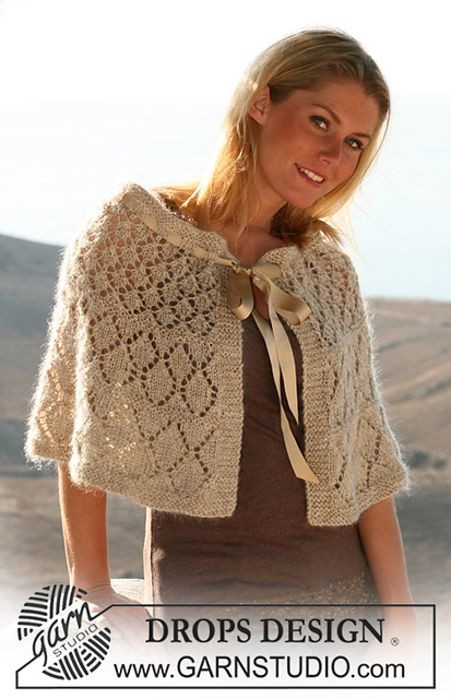 Ravelry: 105-15 Cape with lace pattern pattern by DROPS design