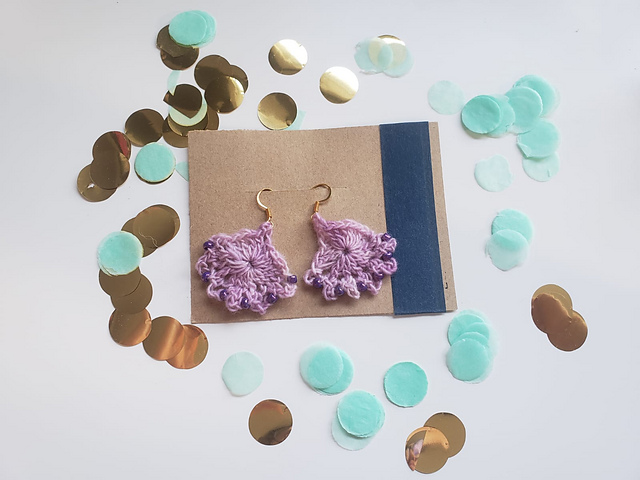 Ravelry: Purple Fan Earrings pattern by the madknatter