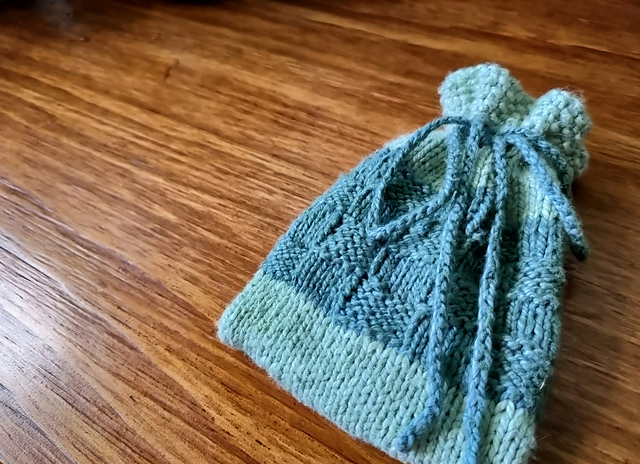 Ravelry: Knit Basketweave Pouch pattern by Annie's Corner