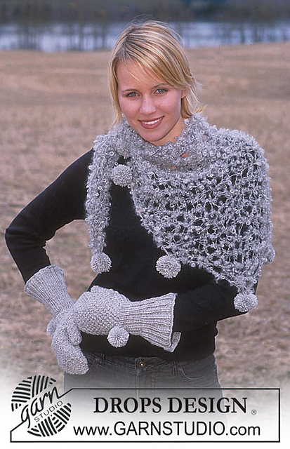 Ravelry: 93-21 a - Shawl with pompoms pattern by DROPS design