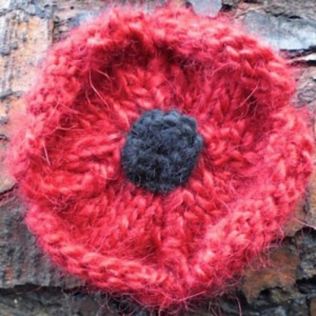 Ravelry: Hand Knitted Poppy Brooch pattern by twigsknits