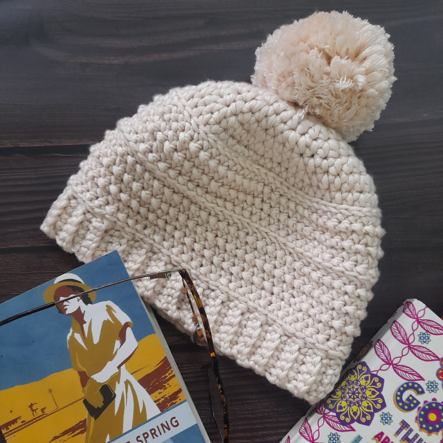 Ravelry: Dotty and Braidy Hat pattern by Kavita Goel