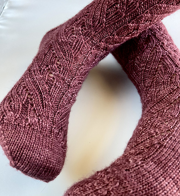 Ravelry: Swirling Socks pattern by verybusymonkey