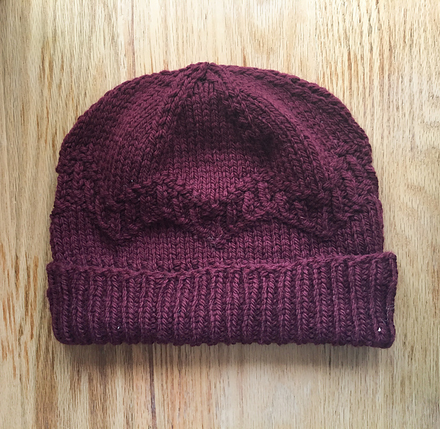 Ravelry: Twisted Chevron Hat pattern by Cat O'Donnell